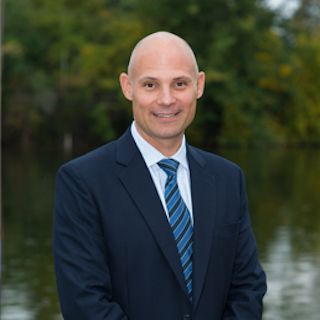 New Head of the Upper School Dr. Aitken Interview – The Blue and White